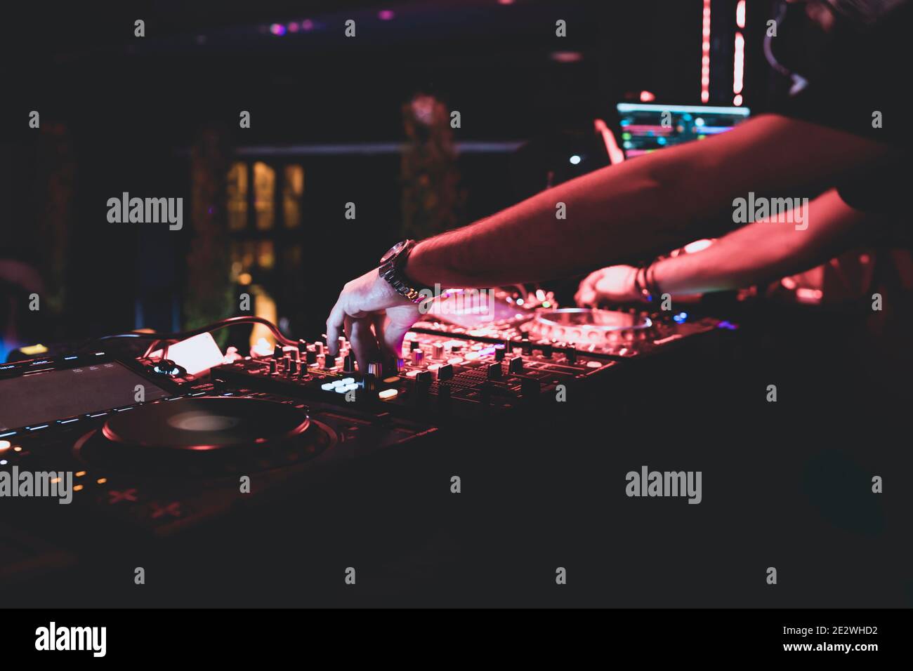 dj mixing music in the disco Stock Photo - Alamy