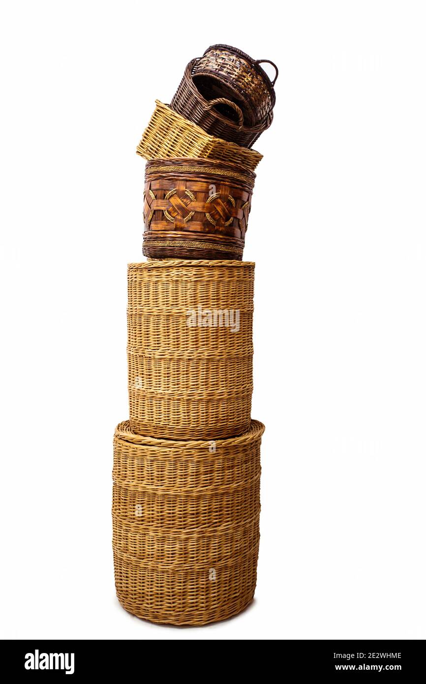 Stack of wicker straw handmade baskets for home storage Stock Photo - Alamy