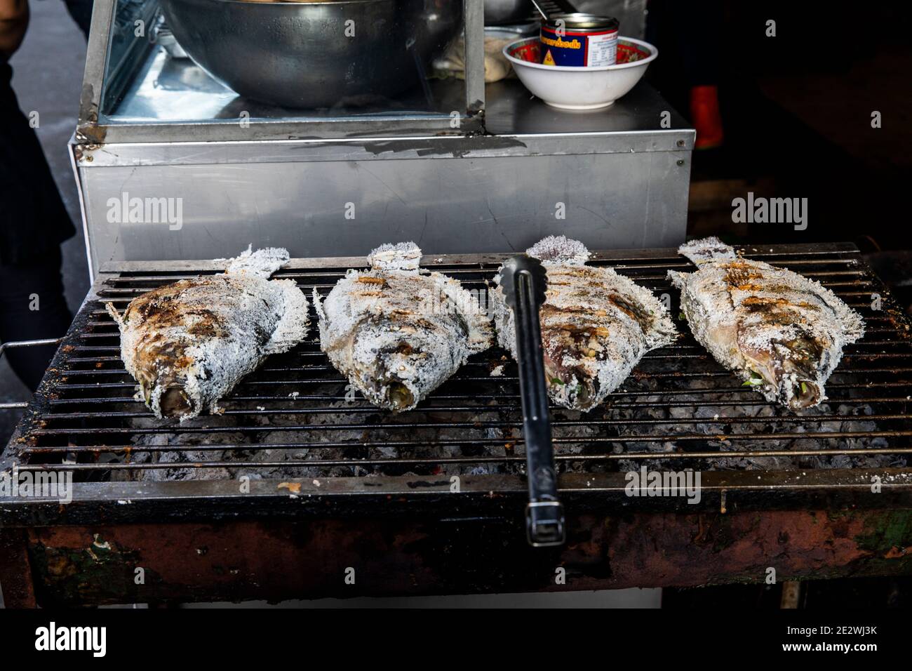 Fish Being Grilled at a Street Food Vendor in Talat Noi, Bangkok Stock ...