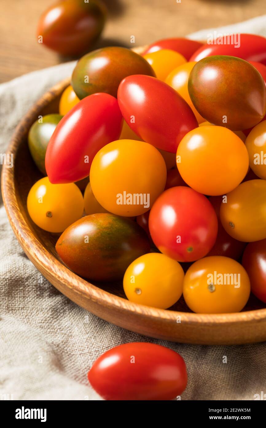 Raw Organic Heirloom Cherry Tomatoes in a Bowl Stock Photo - Alamy