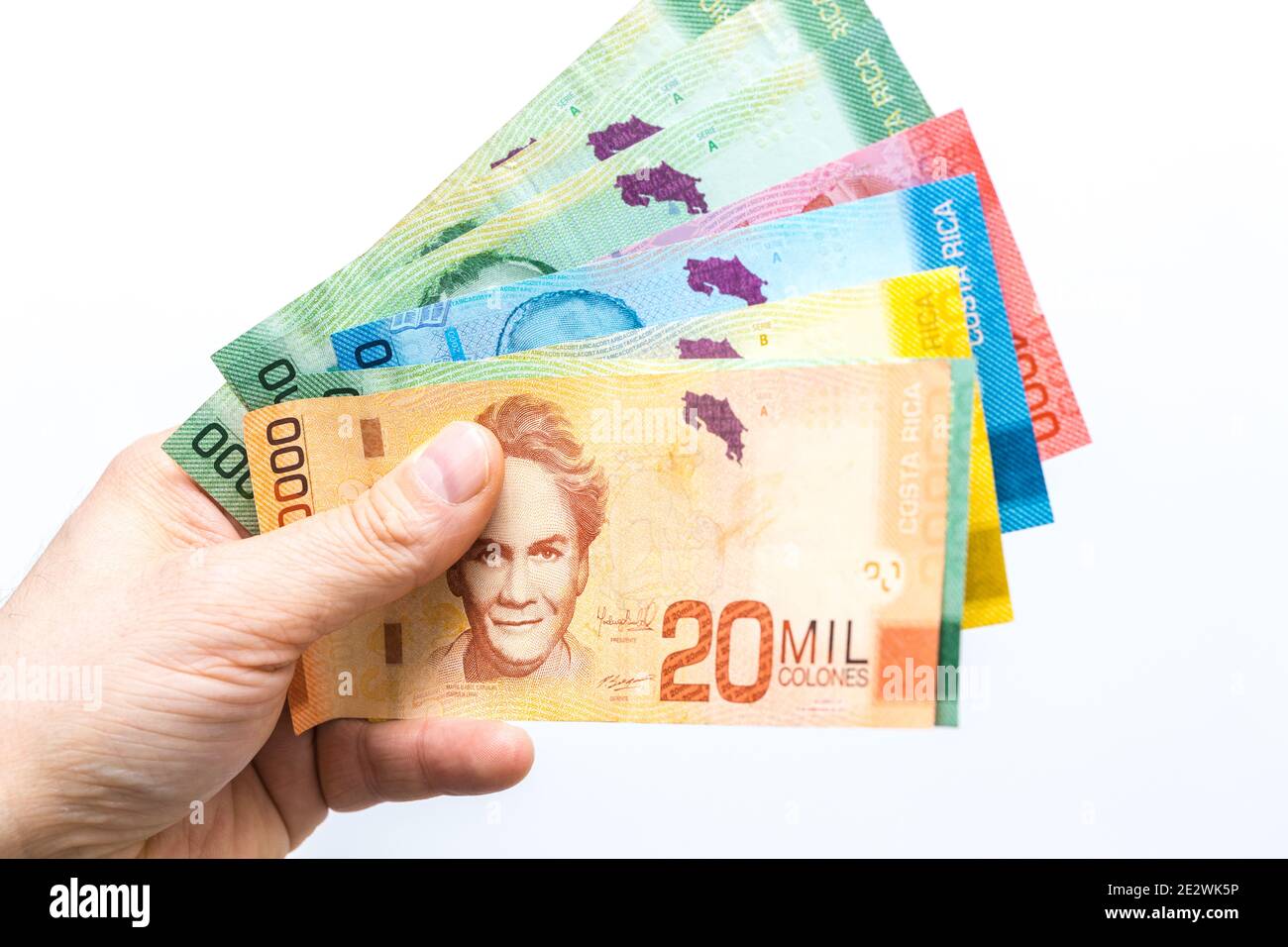 Costa Rican money, Colones, Banknotes spread out in a fan and held in a ...