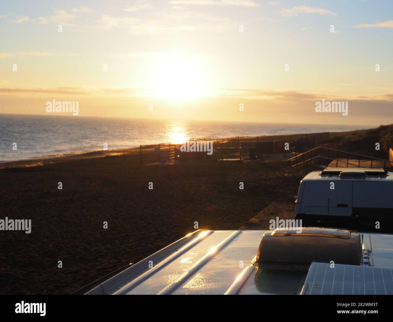 van roof coast sunrise Stock Photo - Alamy