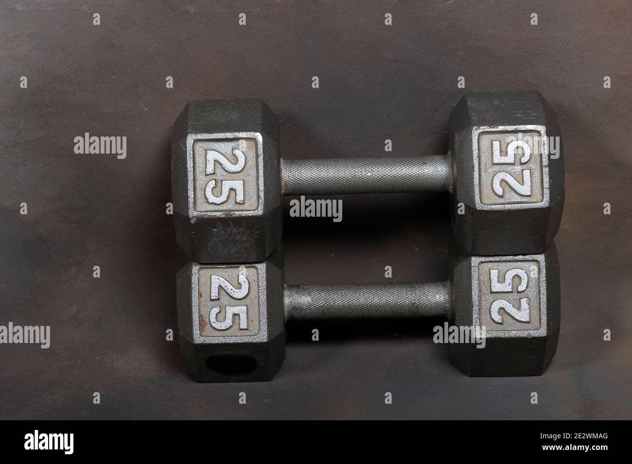 Hand barbells for bicep muscle strengthening Stock Photo - Alamy
