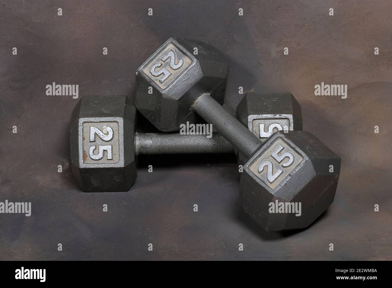 Hand barbells for bicep muscle strengthening Stock Photo - Alamy