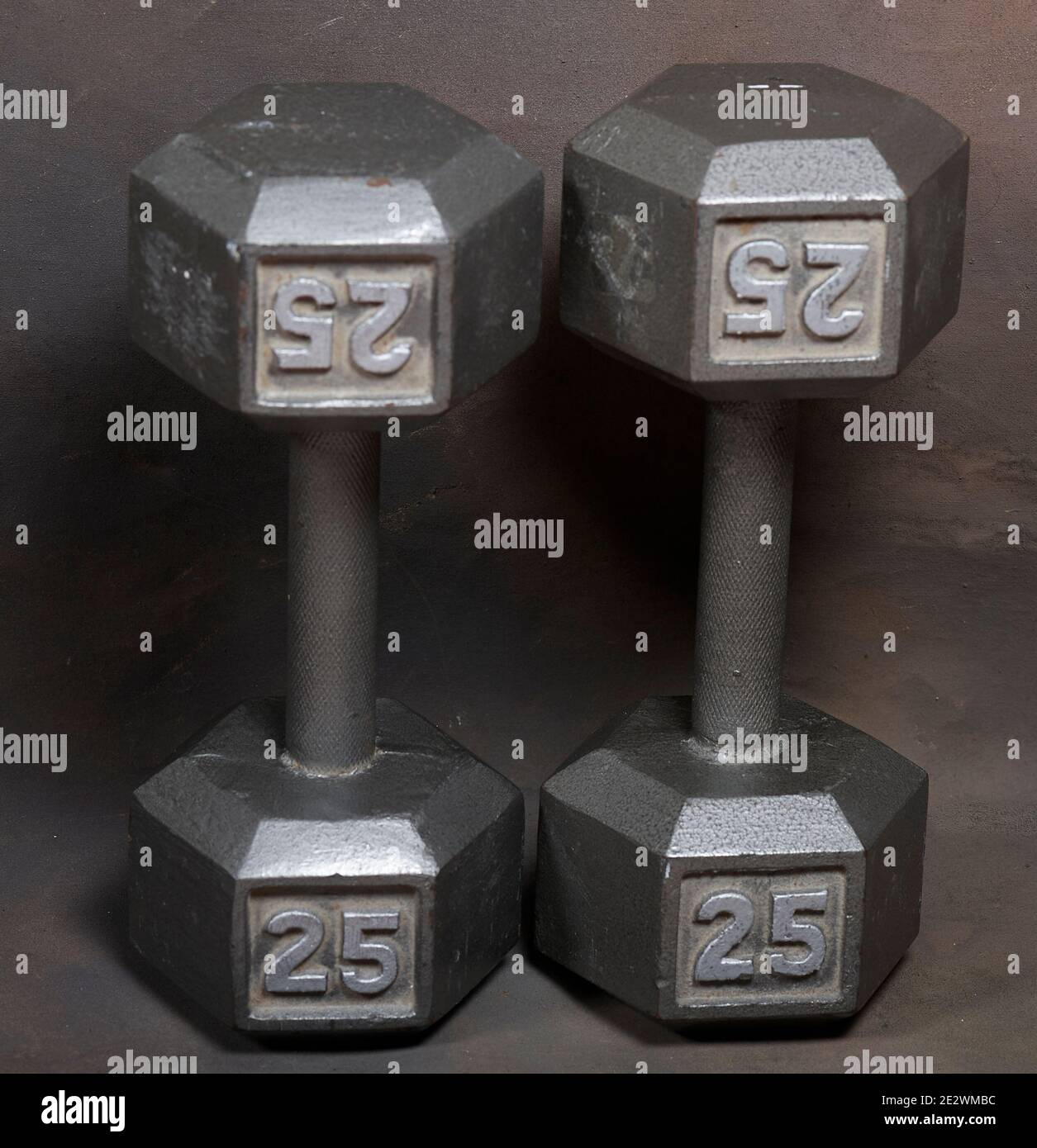 Hand barbells for bicep muscle strengthening Stock Photo - Alamy