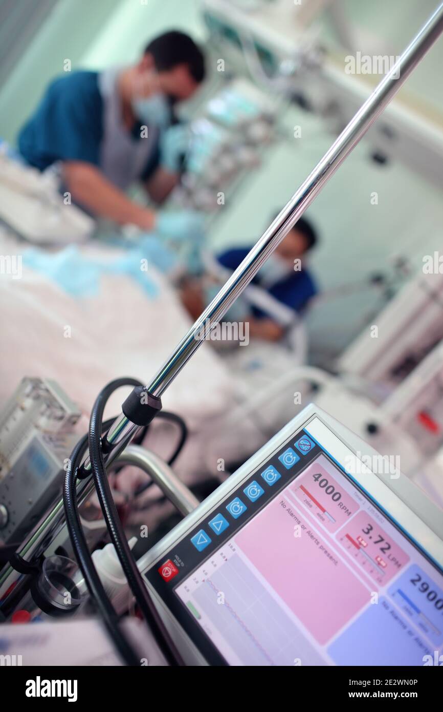 Medical monitor in the background of working people Stock Photo - Alamy