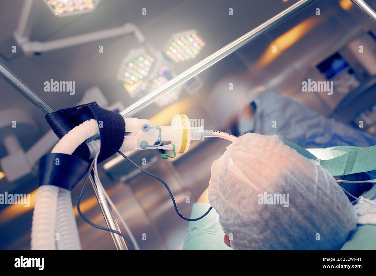 Operating room with working staff next to the patient Stock Photo - Alamy