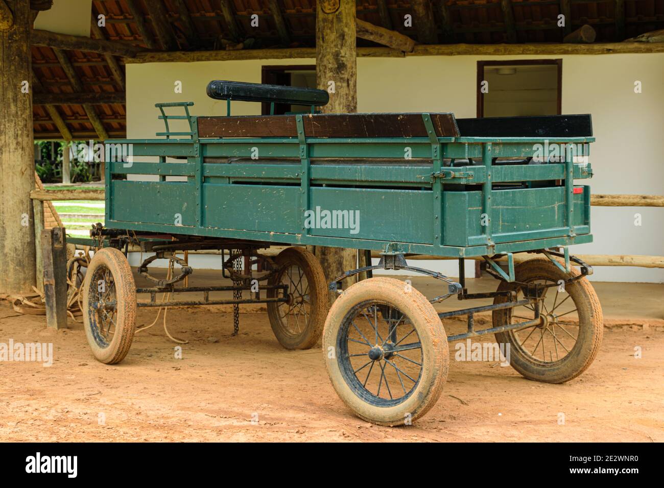 Green antique wagon (buggy) parked - rear view Stock Photo - Alamy