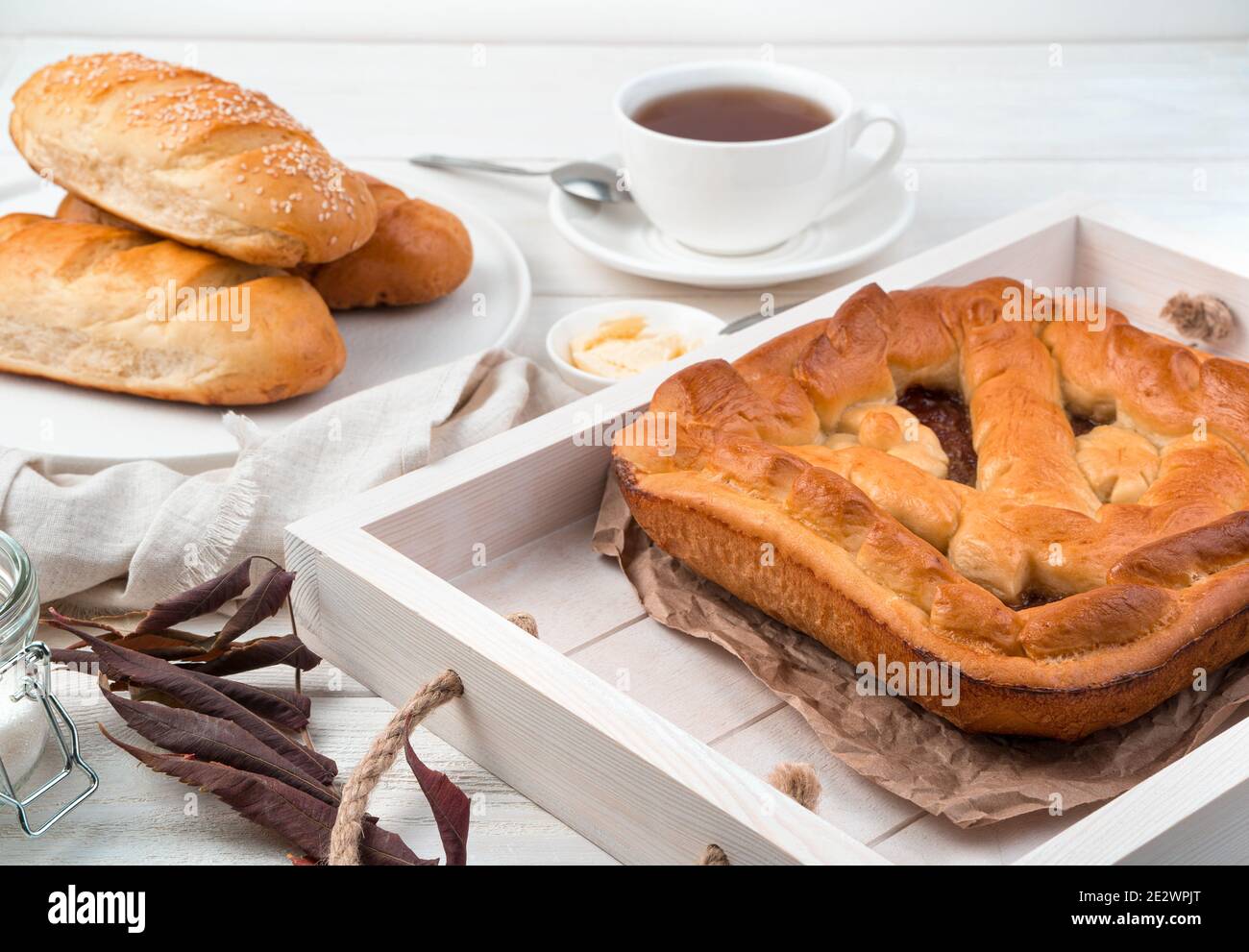 Homemade apple pie on a light background. Side view, with in space to ...