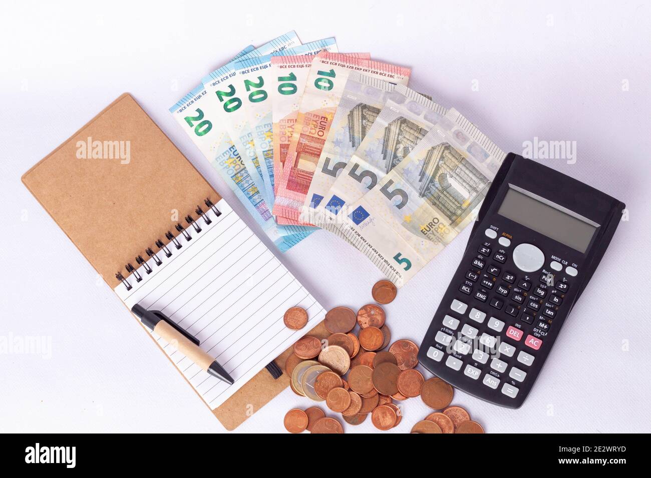 Laptop on table money scattered hi-res stock photography and images - Alamy