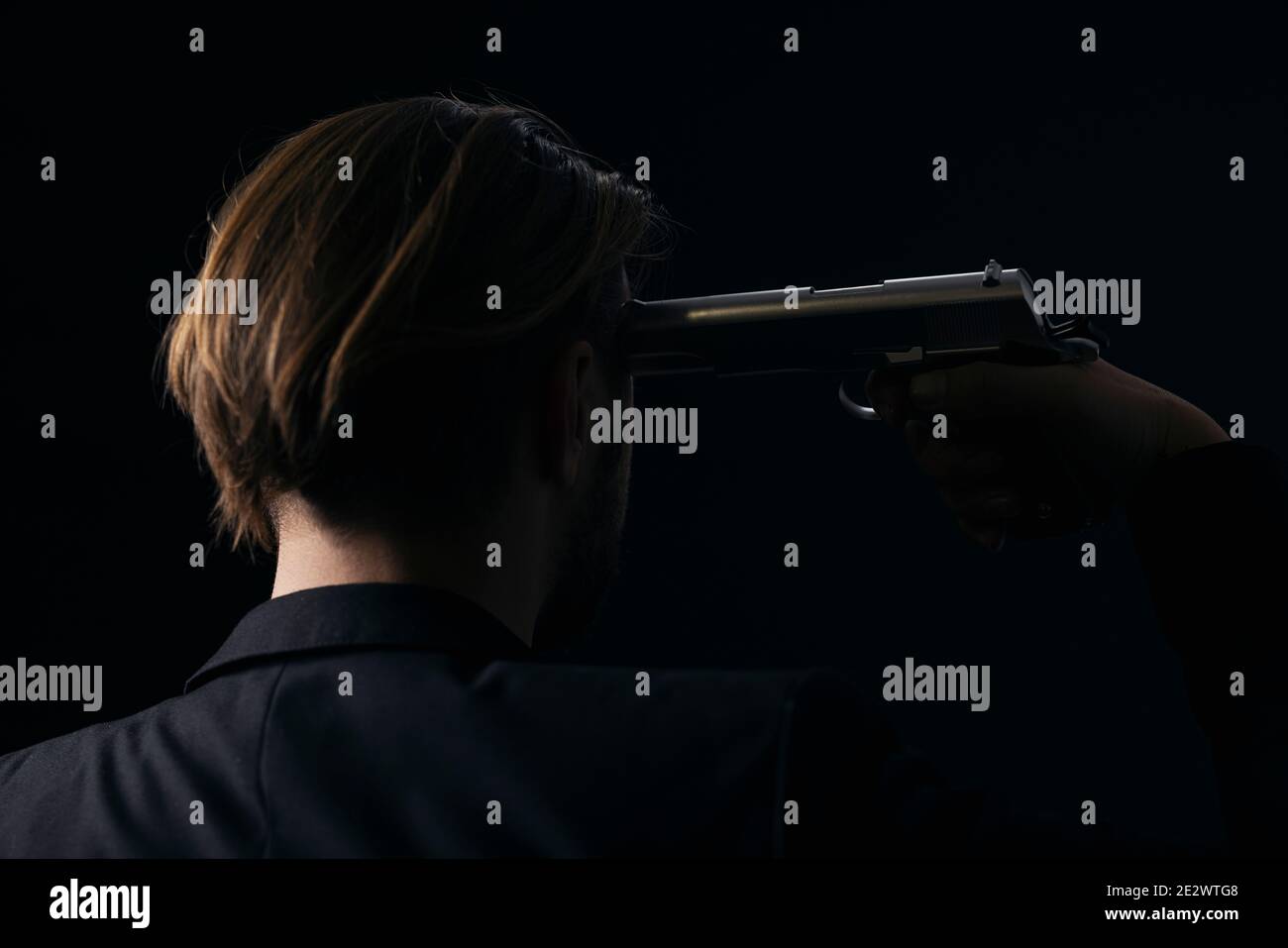 Back view man gun hi-res stock photography and images - Alamy