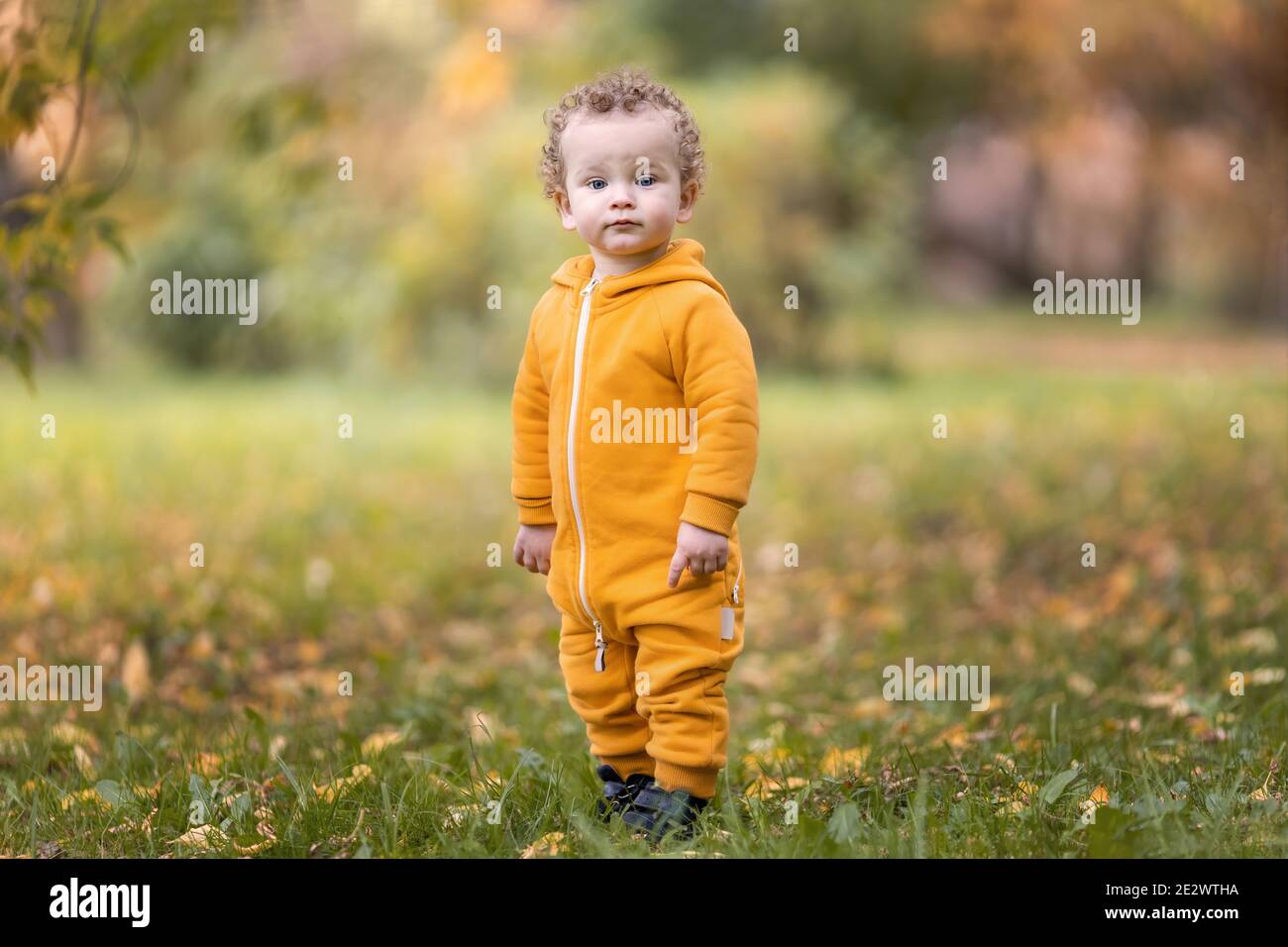 Boy in overalls hi-res stock photography and images - Alamy