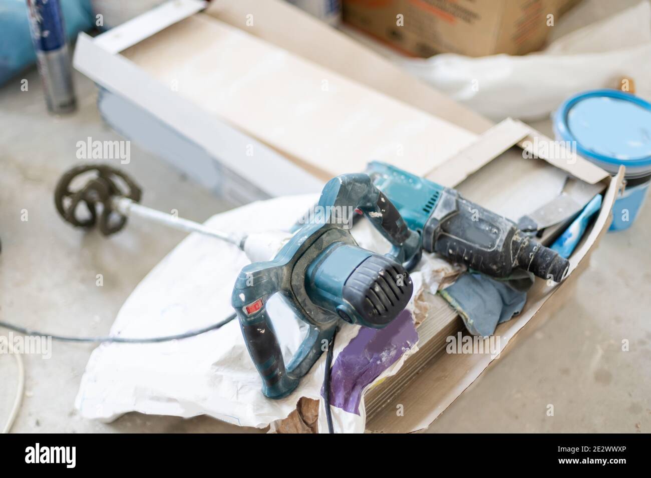 the part of car high pressure pump and the tool for repair on white ...