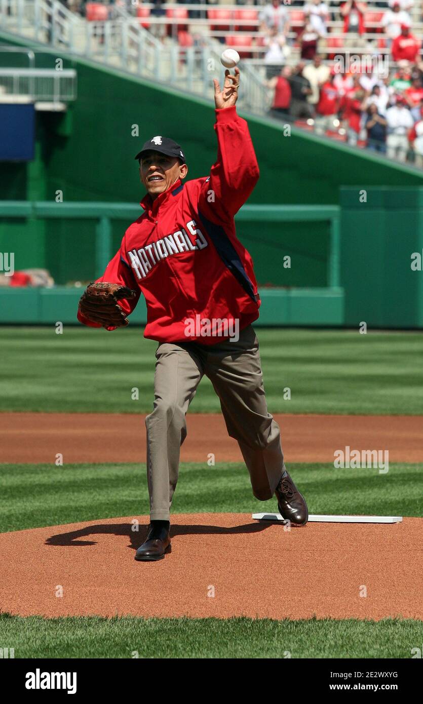 US President Barack Obama throws out the first pitch at the Washingon ...