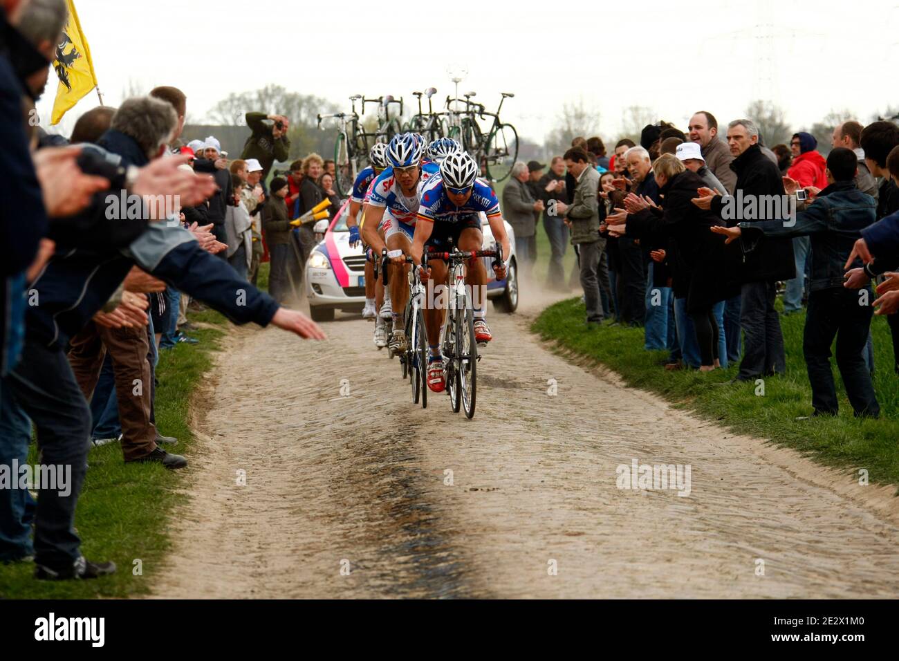 Riders on the cobblestone section "Pont-Thibaut" during the 108th ...
