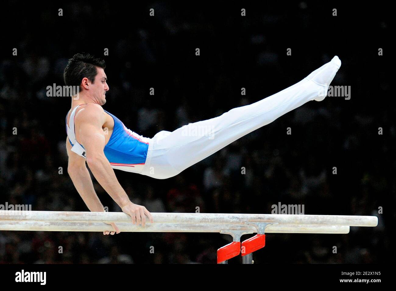 France's Hamilton Sabot won the parallel bars event during the FIG ...