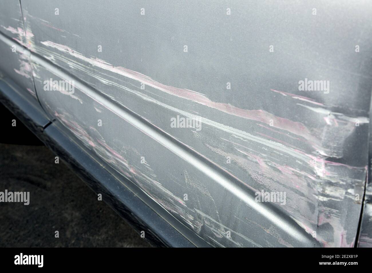 car damage after an accident crash, scratched and crumpled driver's ...