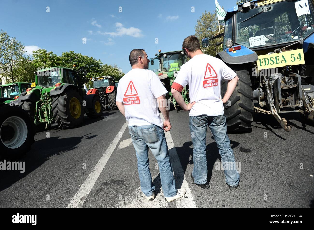 French farmers demonstrate with their tractors in Paris, France on ...