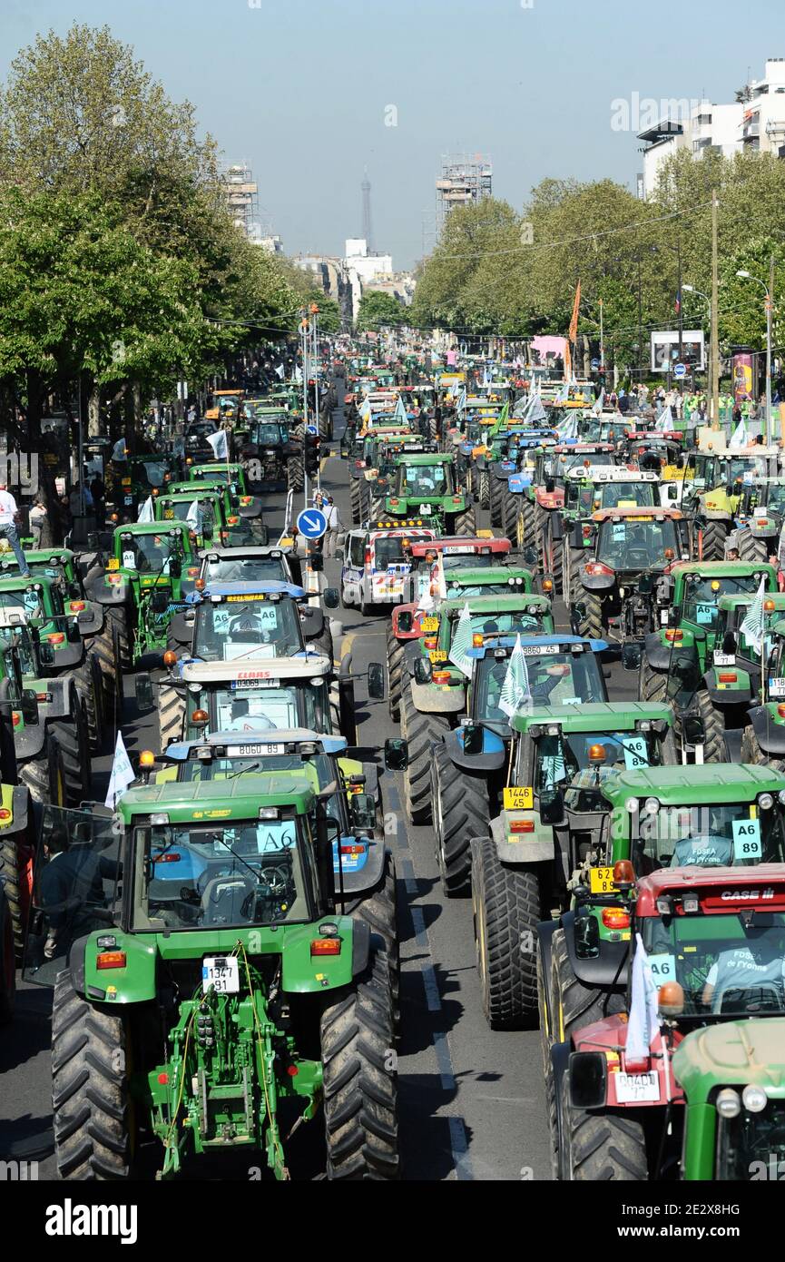 French farmers demonstrate with their tractors in Paris, France on ...