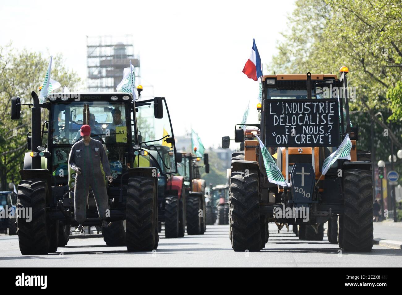 French farmers demonstrate with their tractors in Paris, France on ...