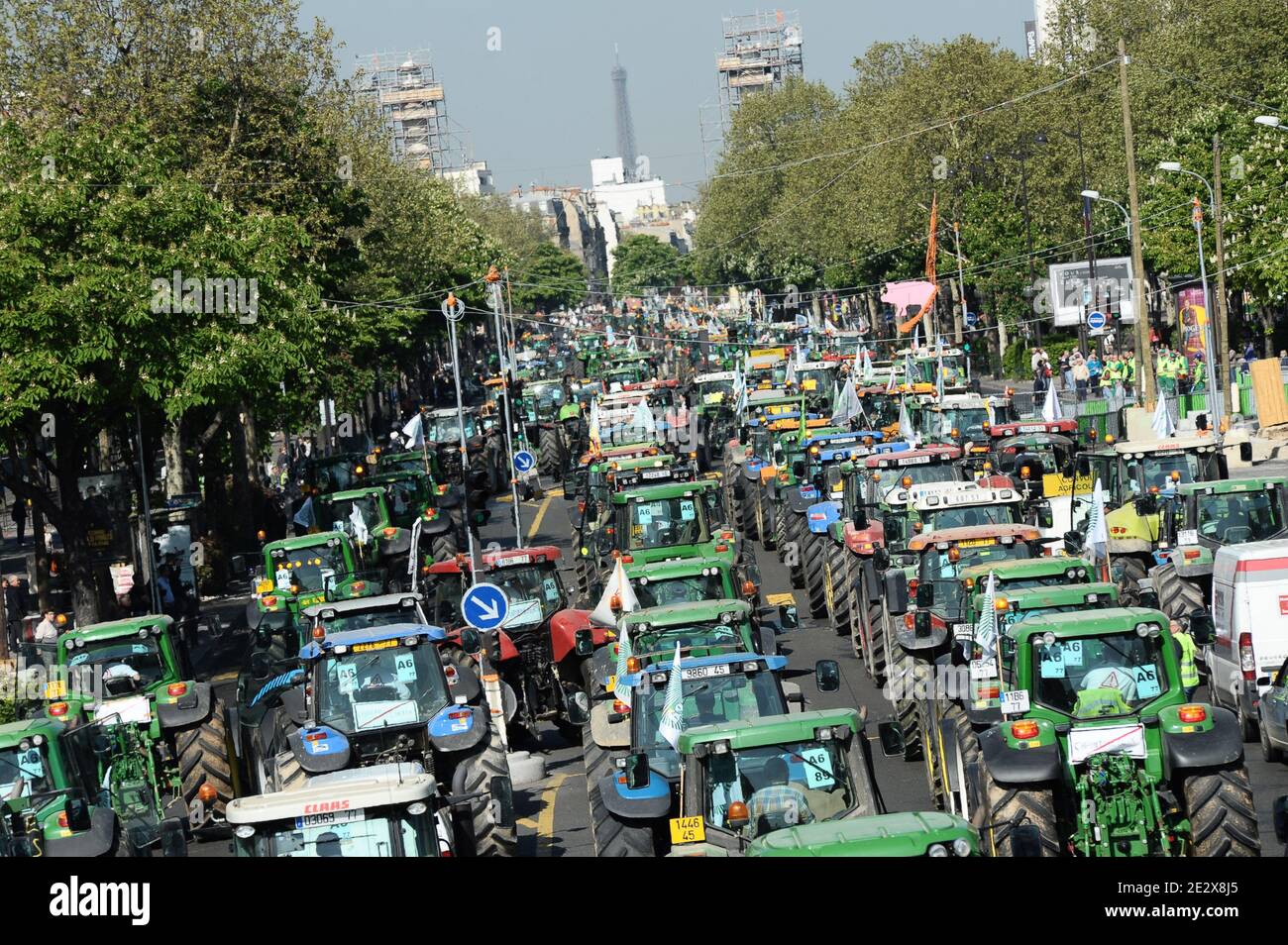 French farmers demonstrate with their tractors in Paris, France on ...
