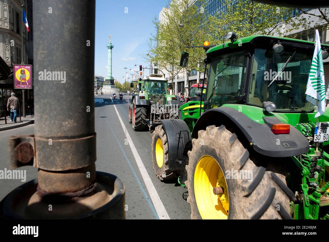French farmers demonstrate with their tractors in Paris, France on ...