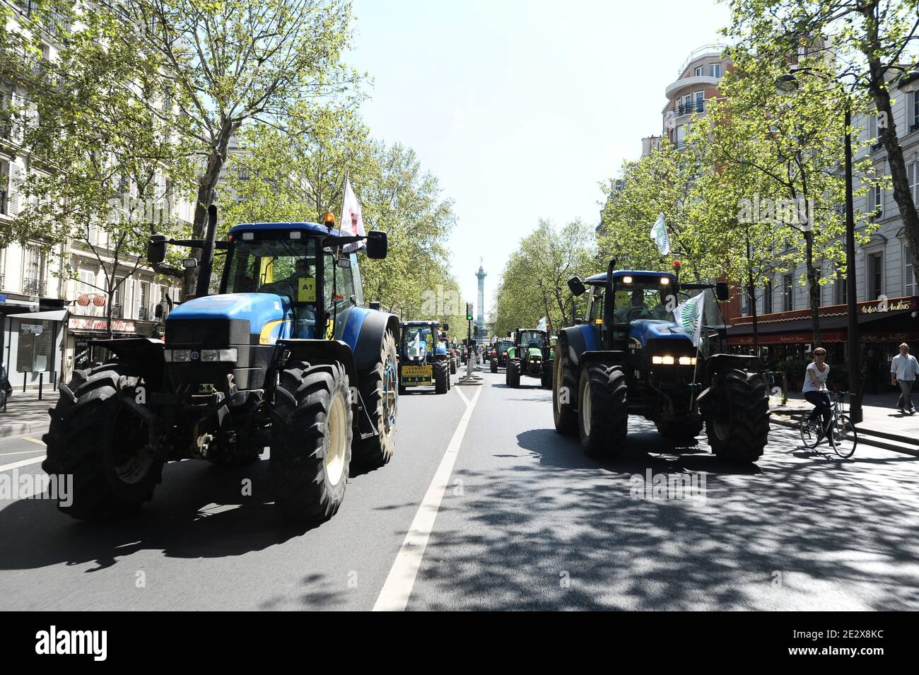 French farmers demonstrate with their tractors in Paris, France on ...