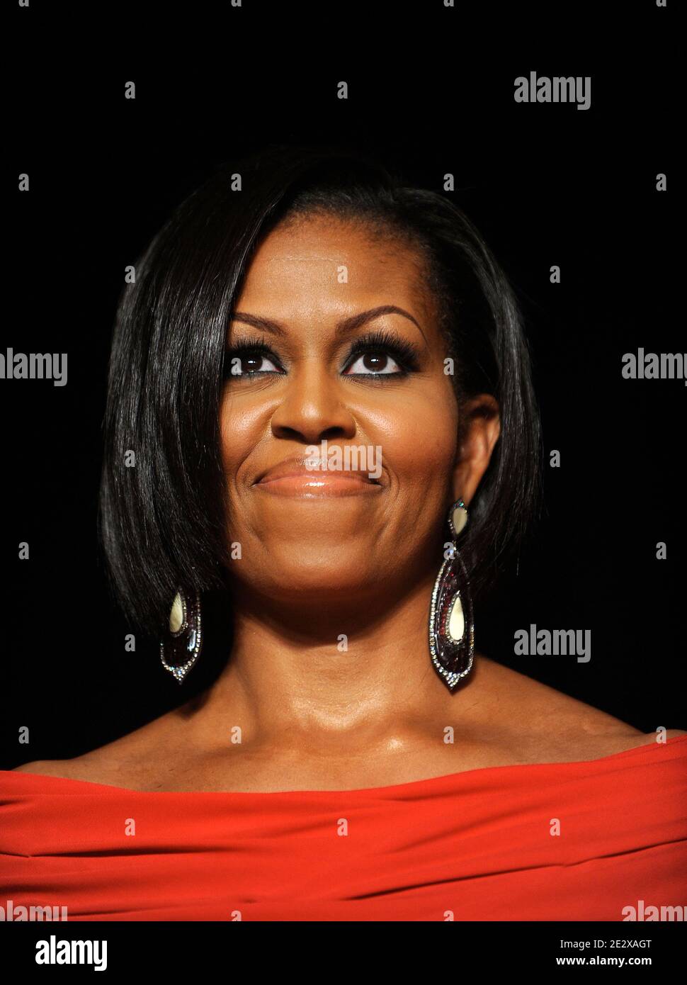 First Lady Michelle Obama looks on during the White House ...