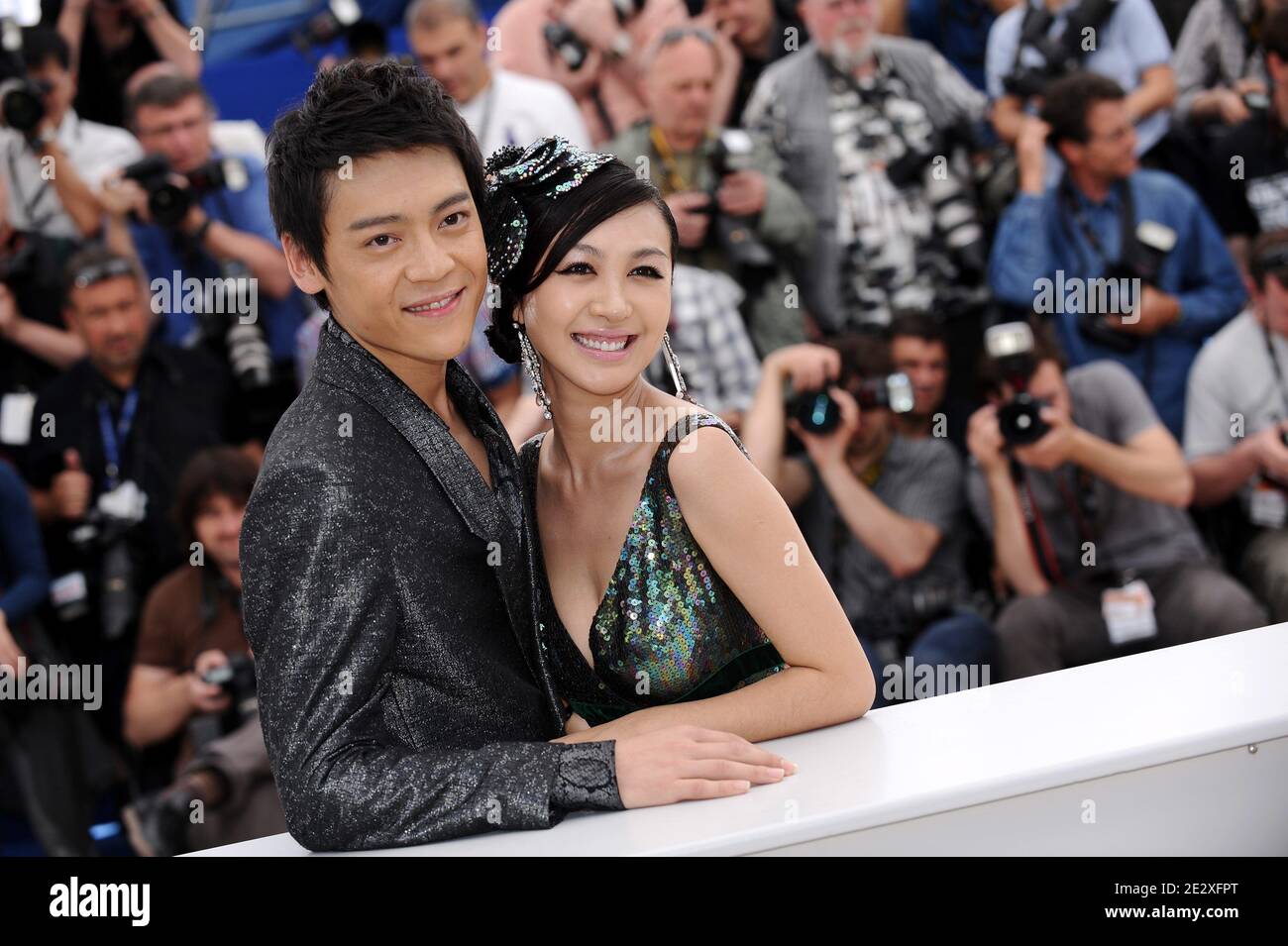 "Hao Qin and Li Feier pose during the photocall of the film ""Rizhao ...
