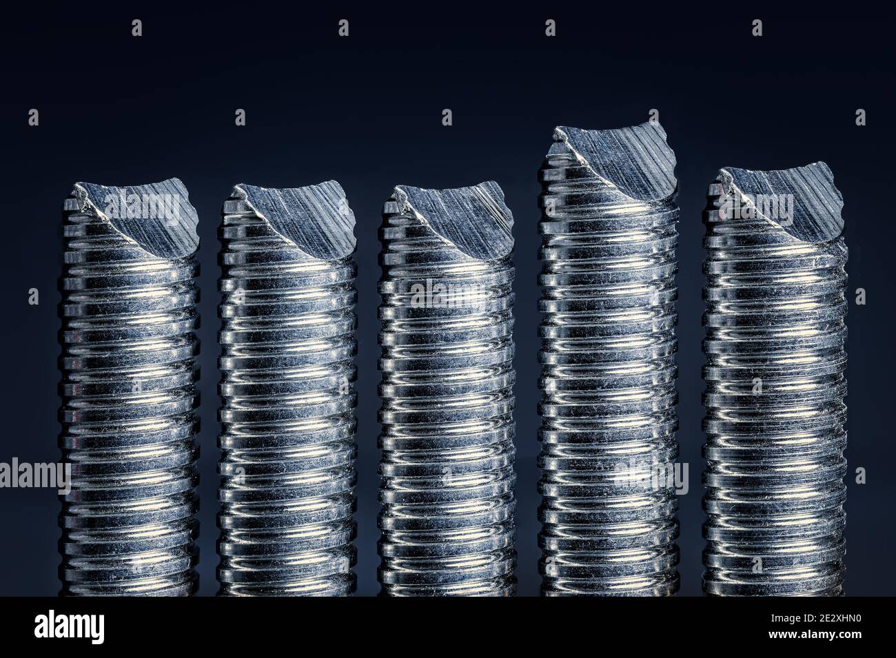 Top parts of stainless steel threaded rods, macro photography Stock ...