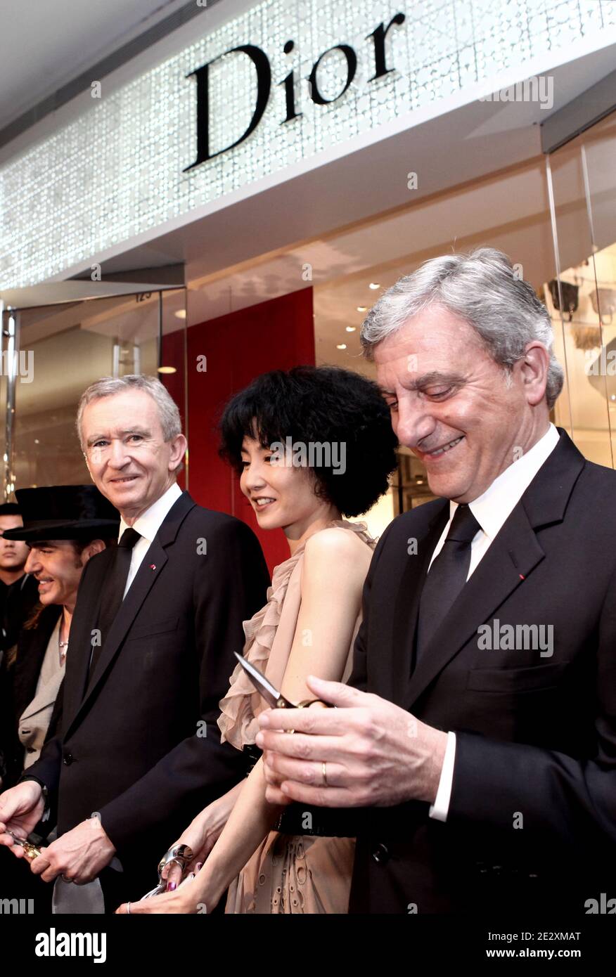 British designer John Galliano, LVMH CEO Bernard Arnault, Chinese ...
