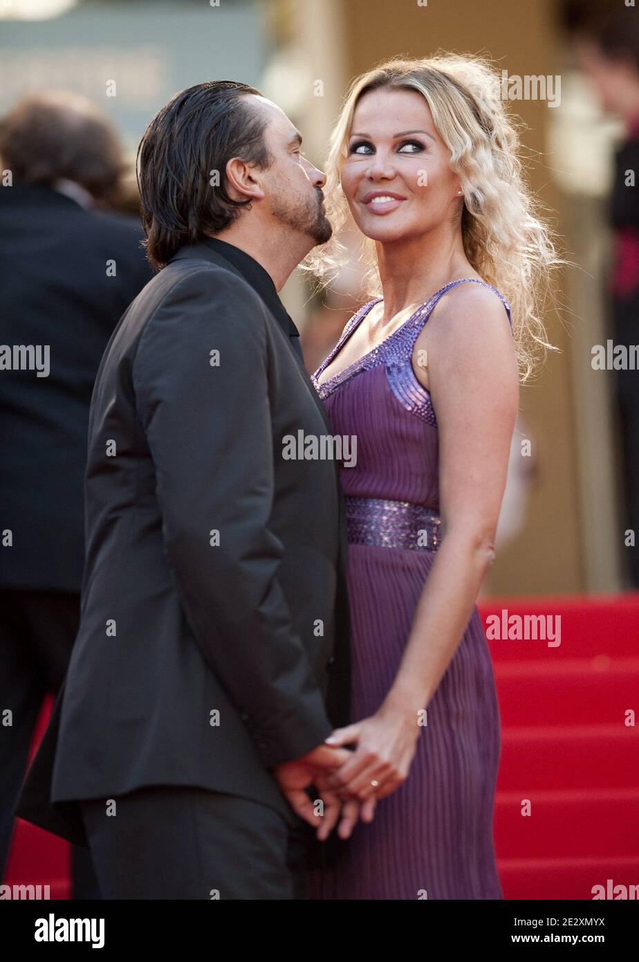Henri Leconte and his wife arriving at the screening of 'Biutiful ...