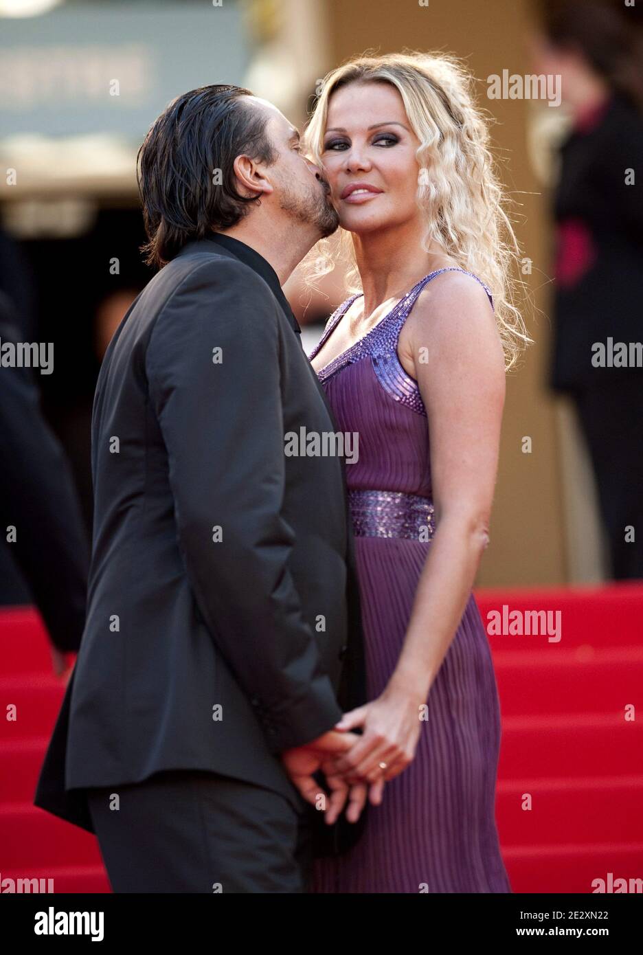 Henri Leconte and his wife arriving at the screening of 'Biutiful ...