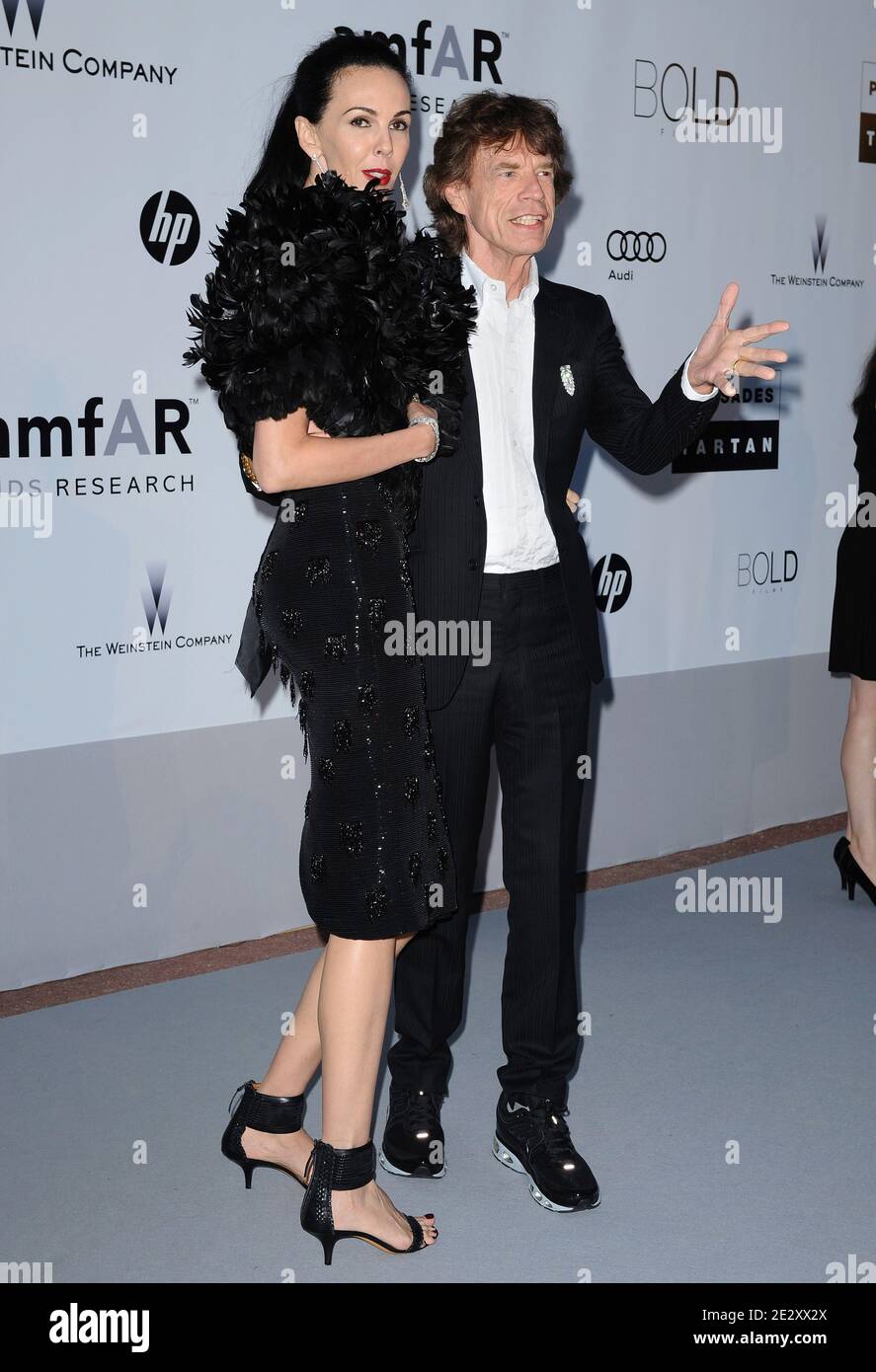 L'wren Scott and Mick Jagger attending the amfAR's Cinema Against AIDS ...