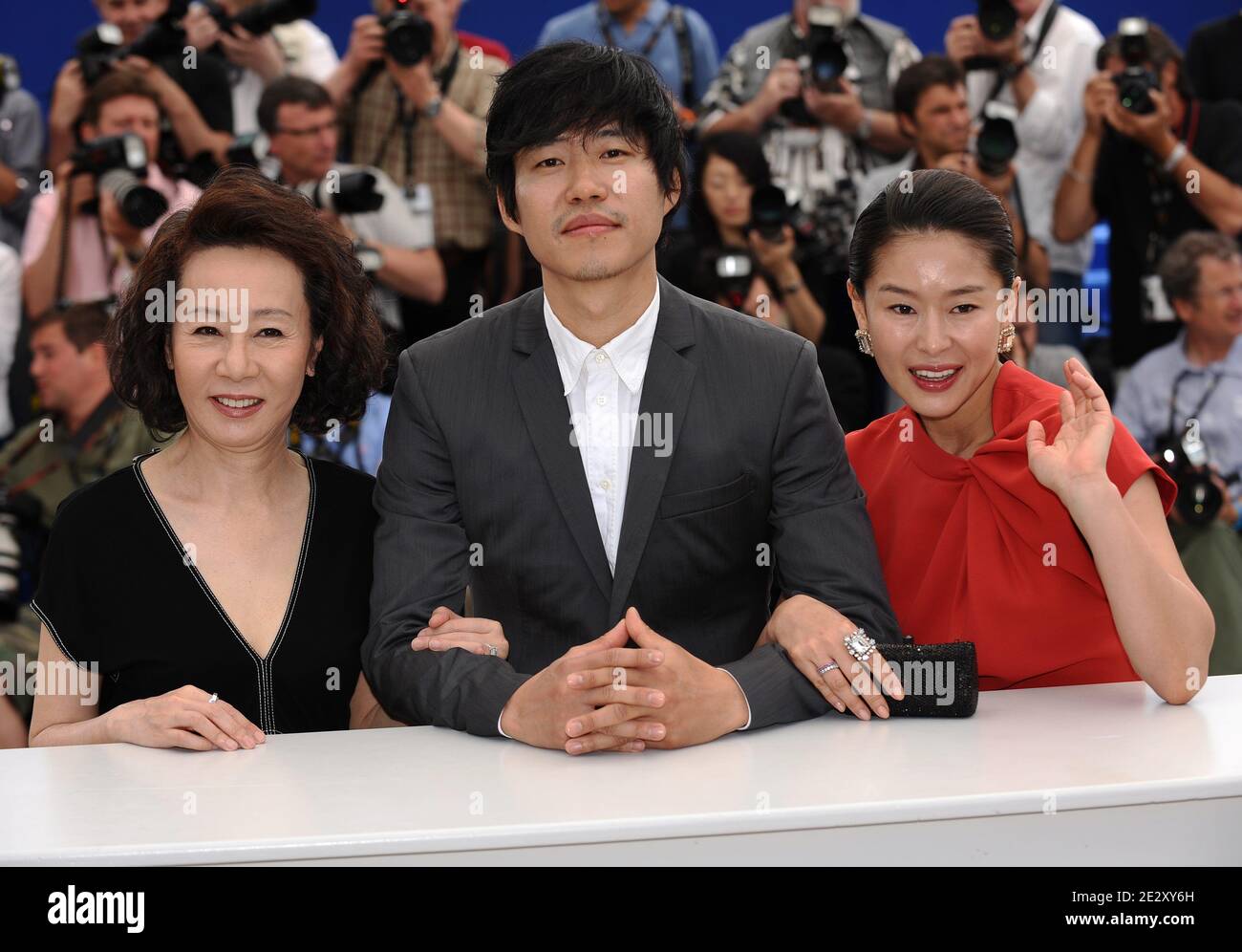 (L-R) Yuh-Jung Youn, Joonsang Yu and Jiwon Ye during the photocall of ...