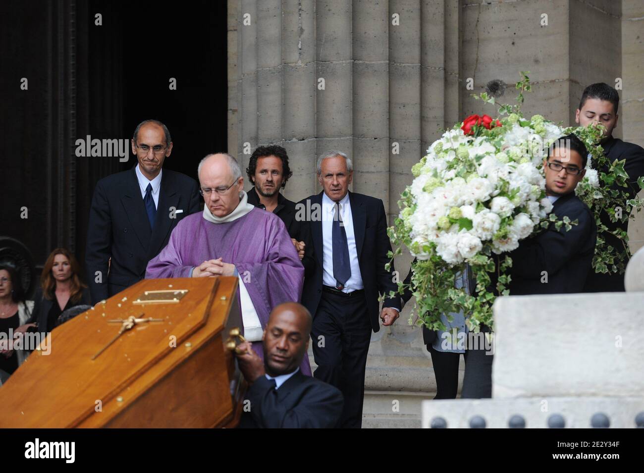 Patrice Laffont and family attend a religious ceremony for the funeral ...