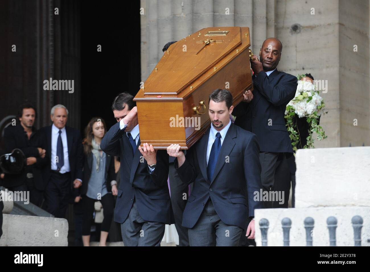 Patrice Laffont and family attend a religious ceremony for the funeral ...