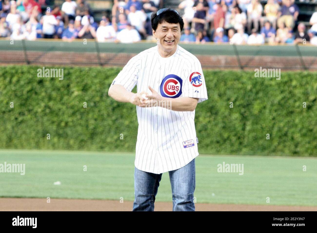 Jacky Chan throws out the first pitch at the Chicago Cubs vs. Los ...