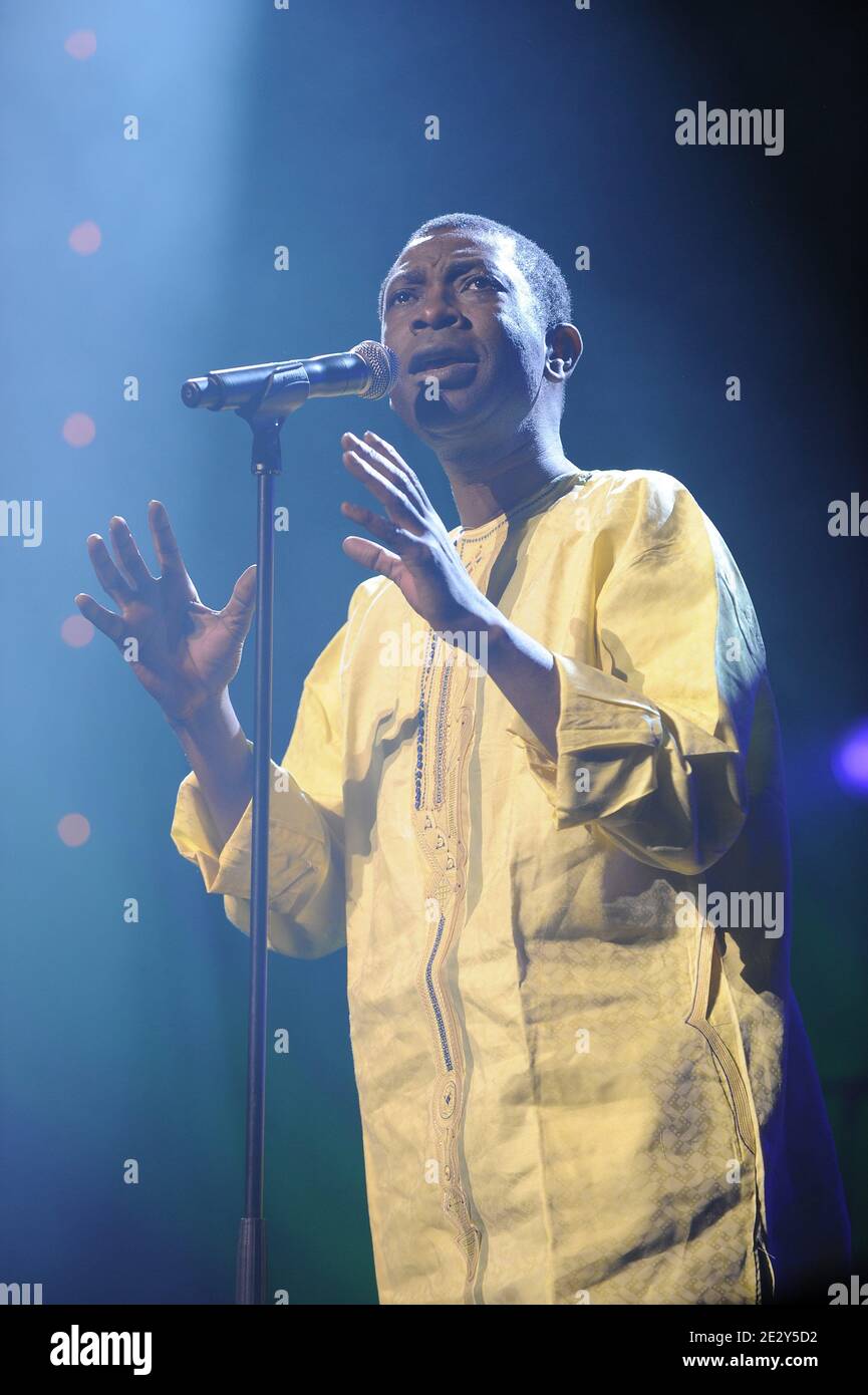 Senegalese singer and author Youssou N'Dour performs during a charity ...