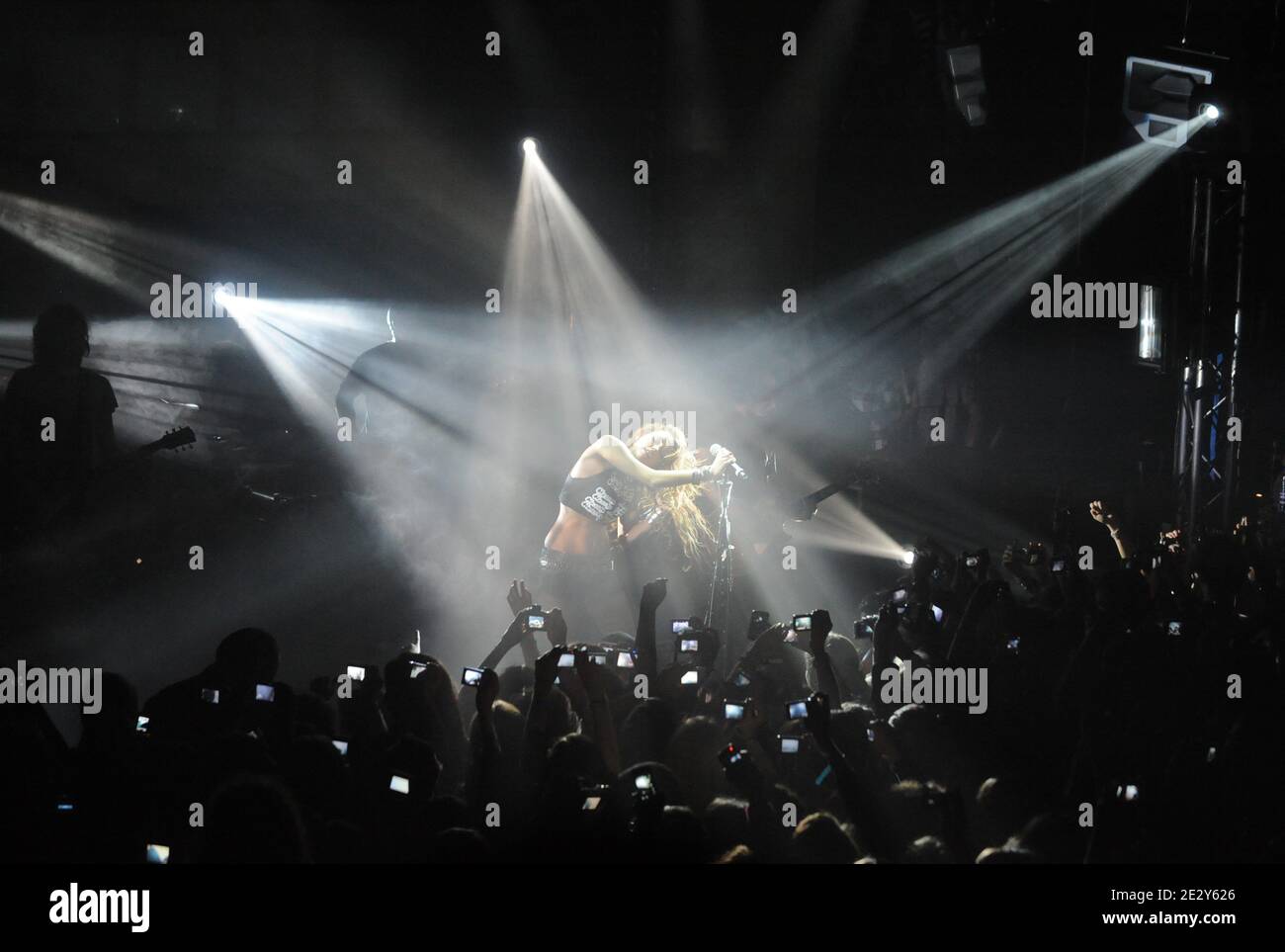 Miley Cyrus performs live during a private concert at the 1515 in Paris ...
