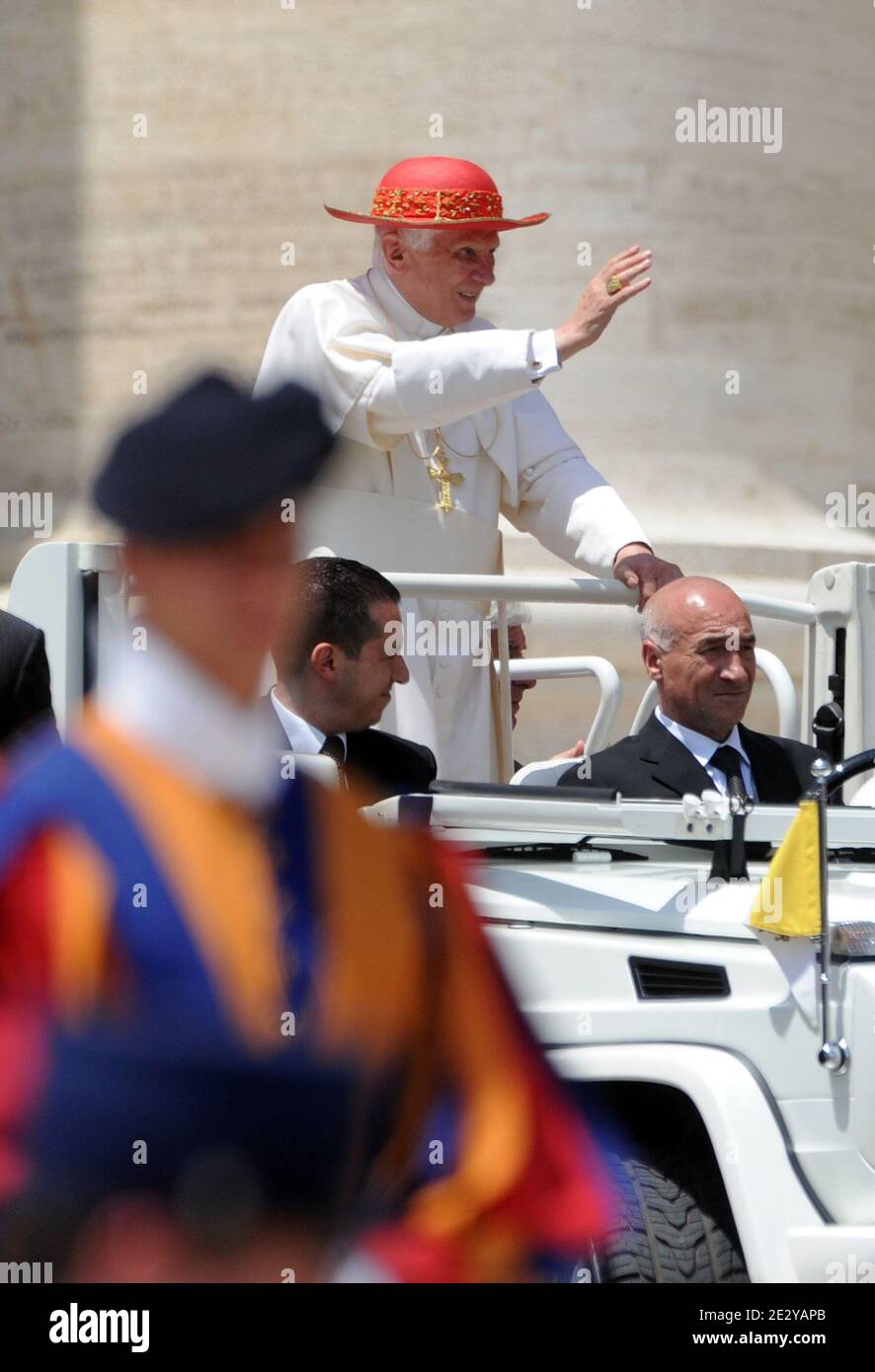 Sunny day in Rome: Pope Benedict XVI wears his red Saturn hat , named ...