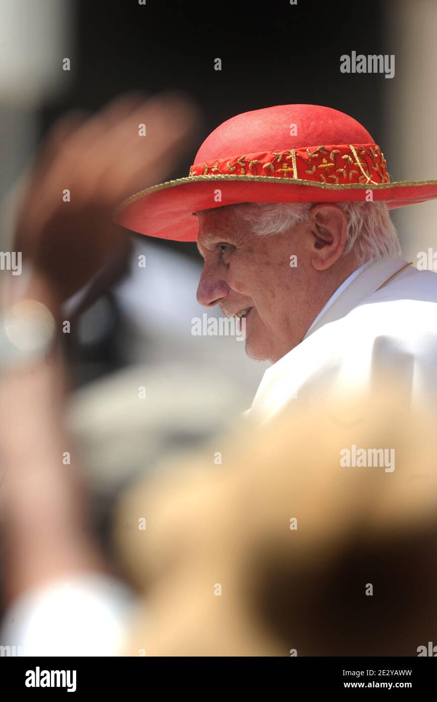 Sunny day in Rome: Pope Benedict XVI wears his red Saturn hat , named ...