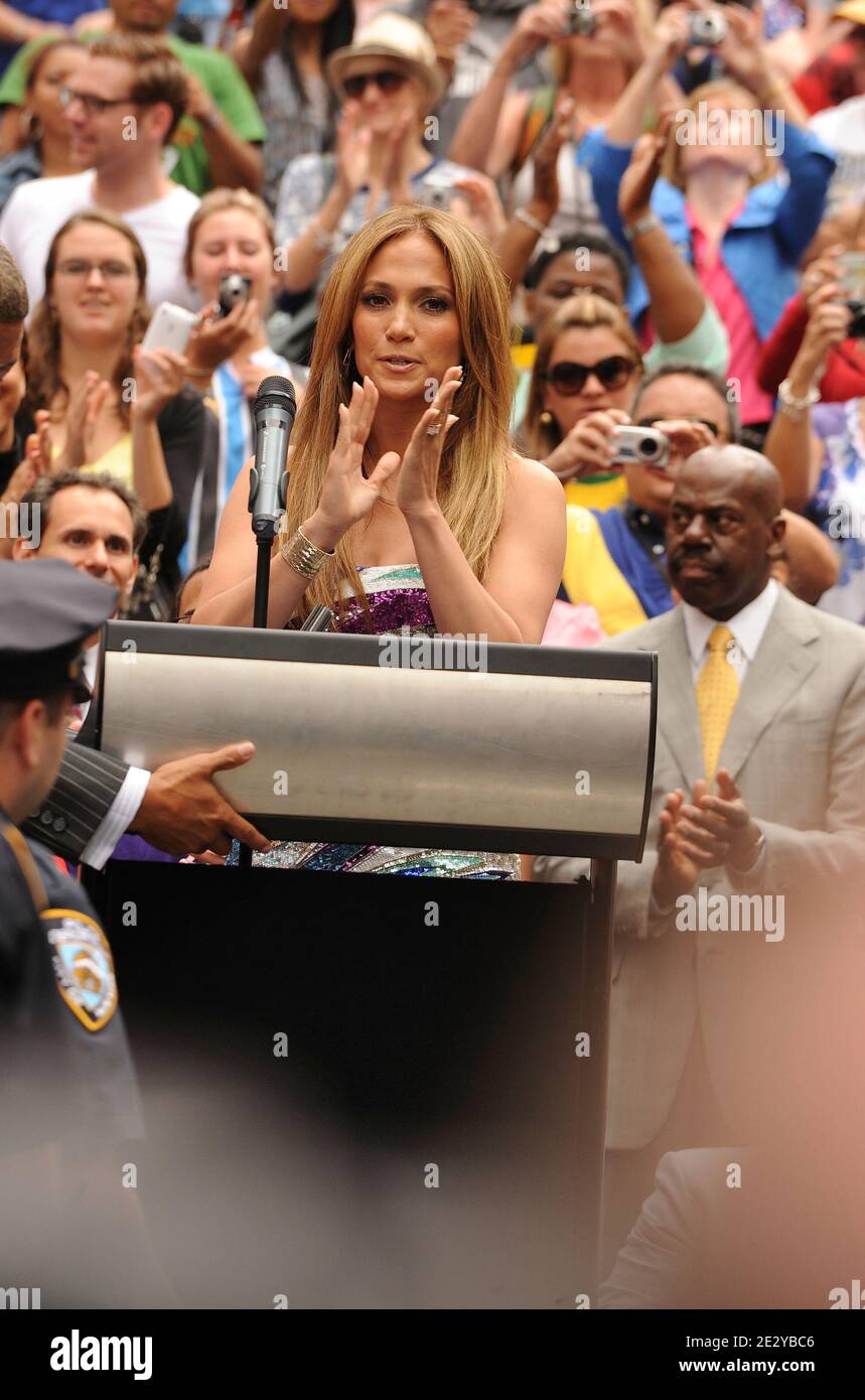 Jennifer Lopez attends the unveiling of her Be Extraordinary billboard ...