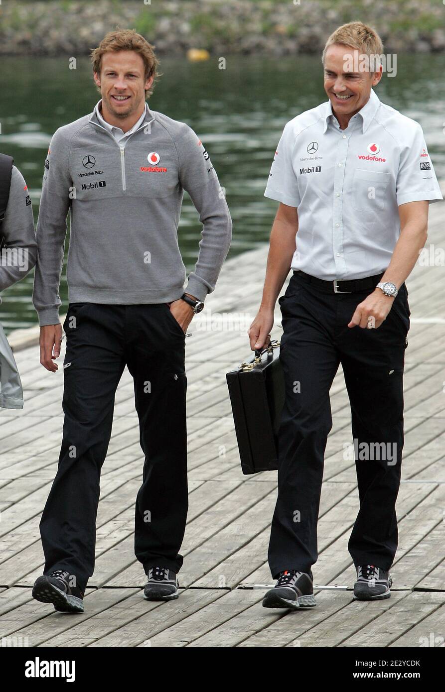 Jenson Button and Martin Whitmarsh are arriving at the paddock for the ...
