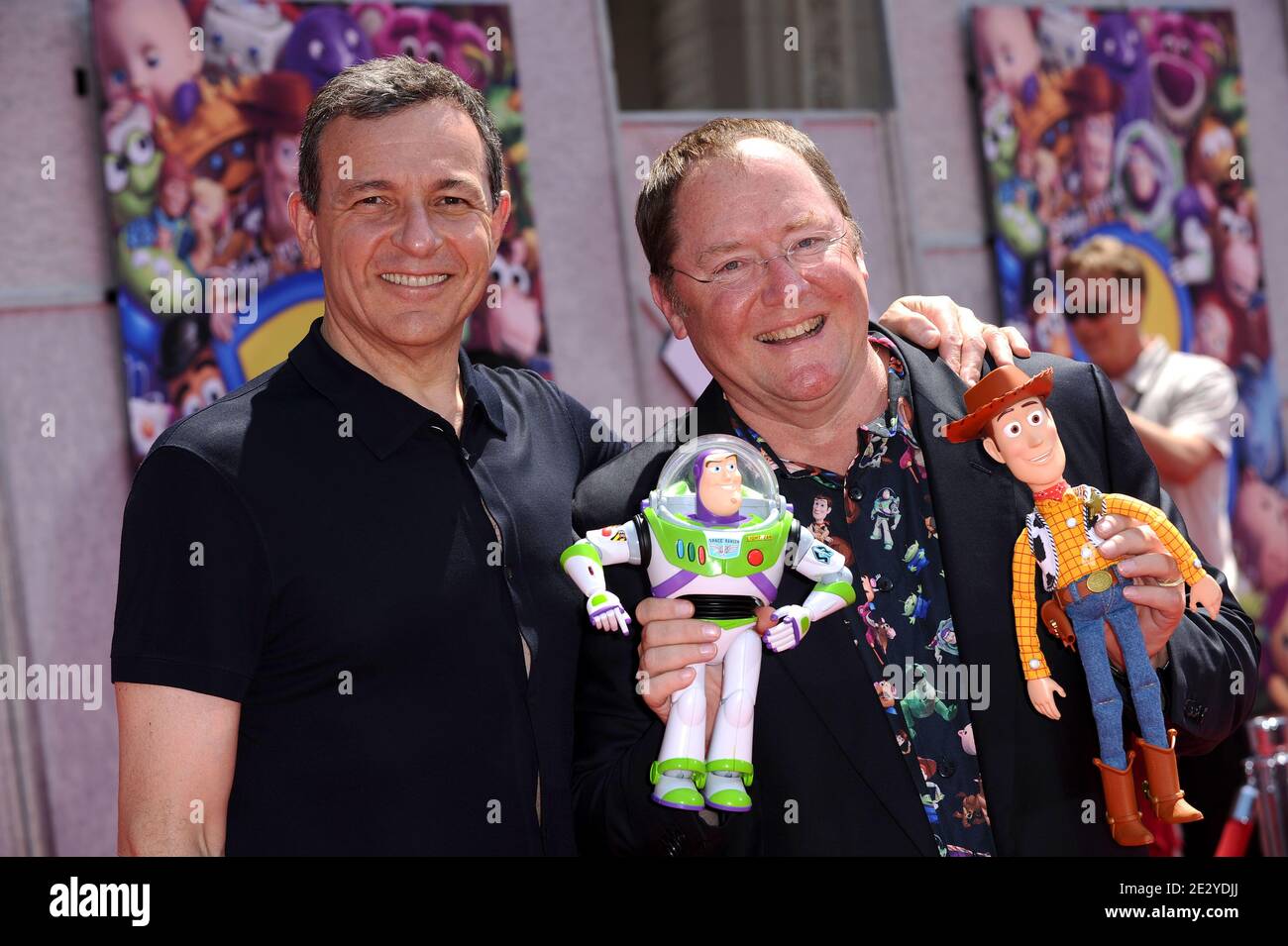 Robert A. Iger (L) and John Lasseter arriving for the World Premiere of ...
