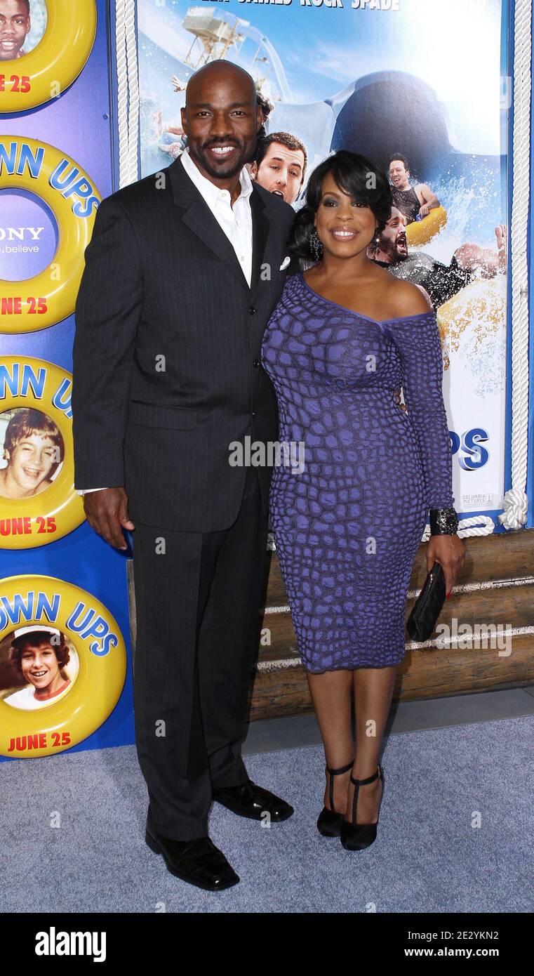 Jay Tucker and Niecy Nash attend the Grown Ups Premiere at the Ziegfeld ...
