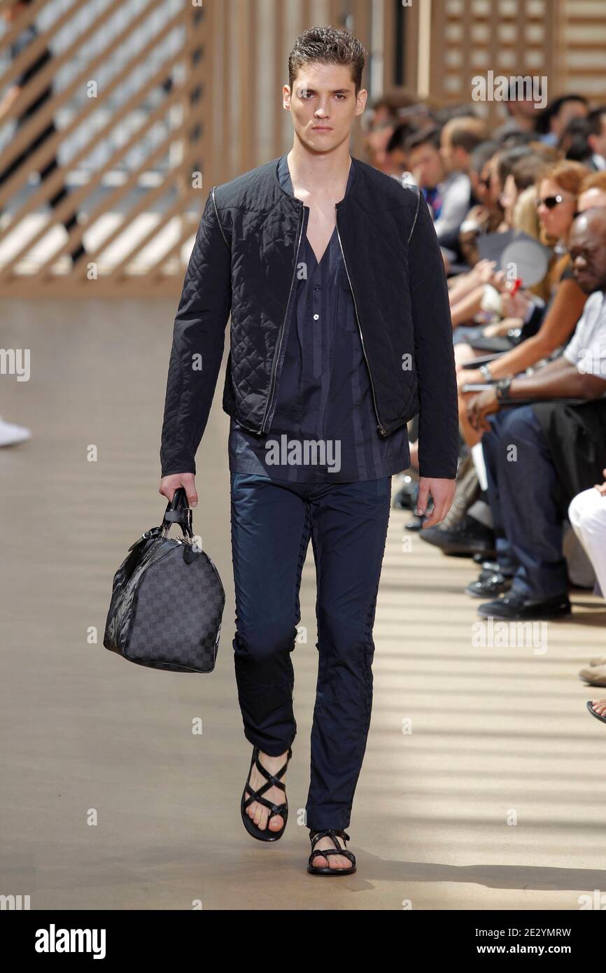 A model wears a creation of Louis Vuitton Men's fashion Spring-Summer ...