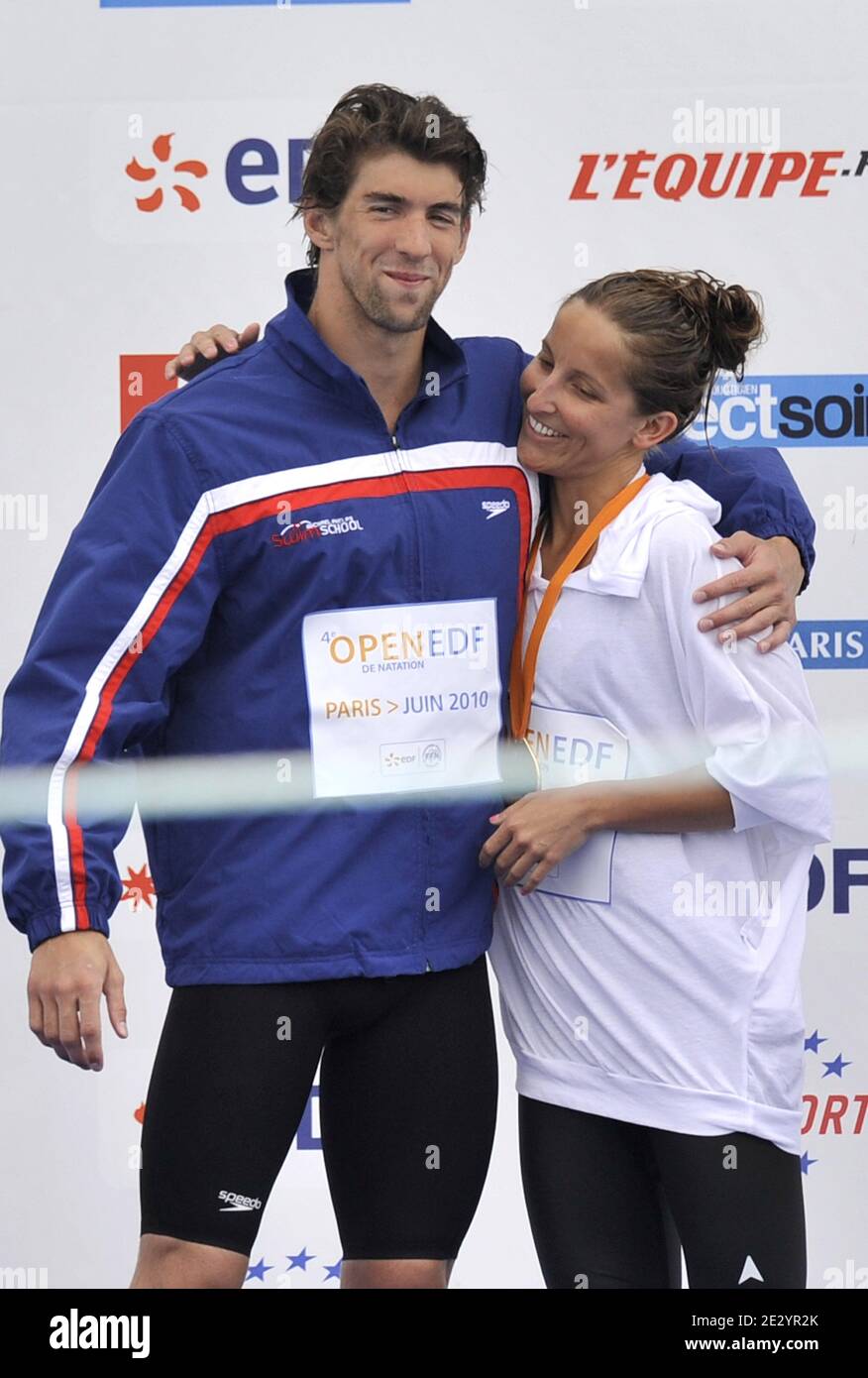USA's Michael Phelps and Kimberly Vandenberg attend the fourth Swimming ...