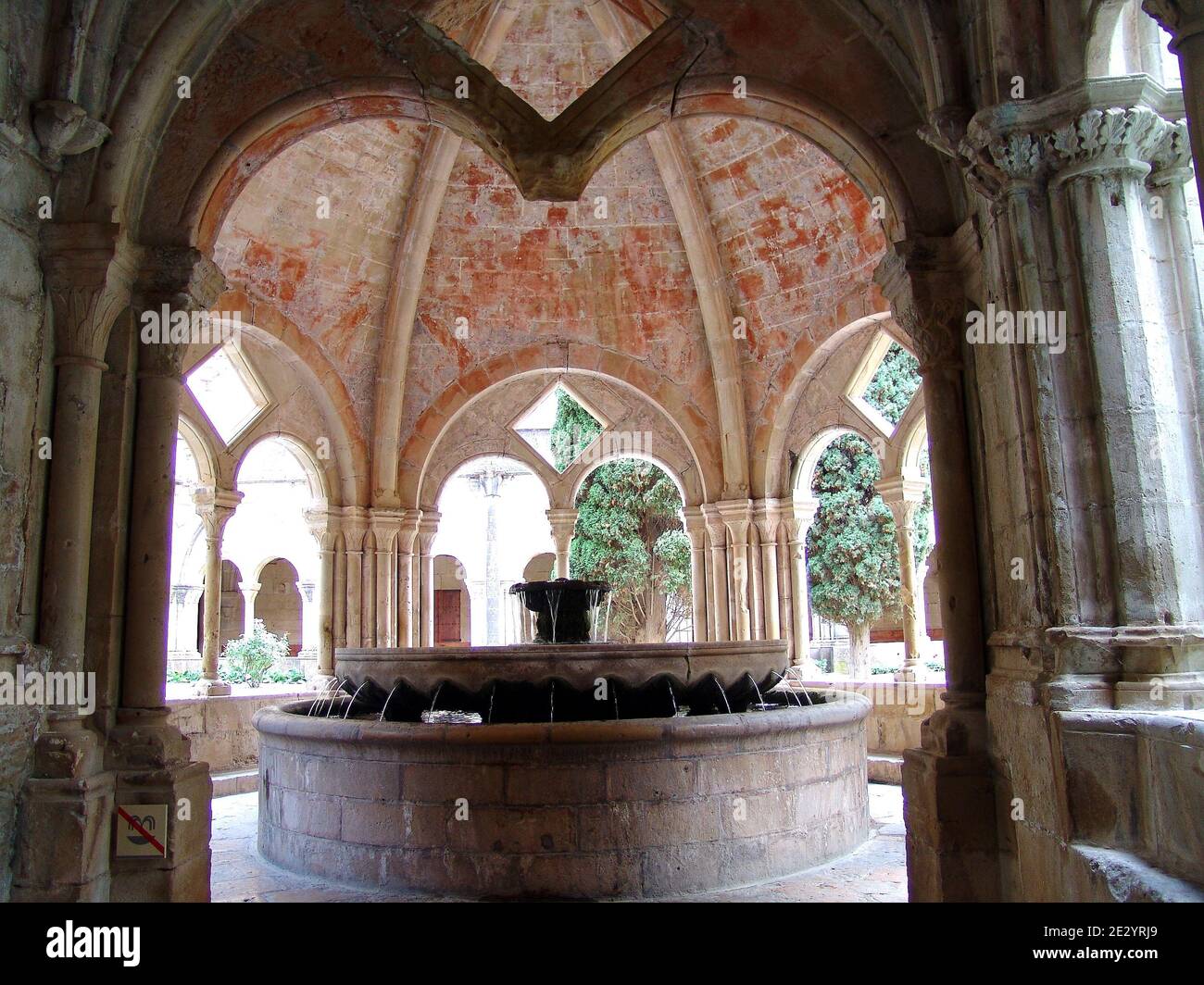 Beautiful shot of a water fountain inside of the building with big ...