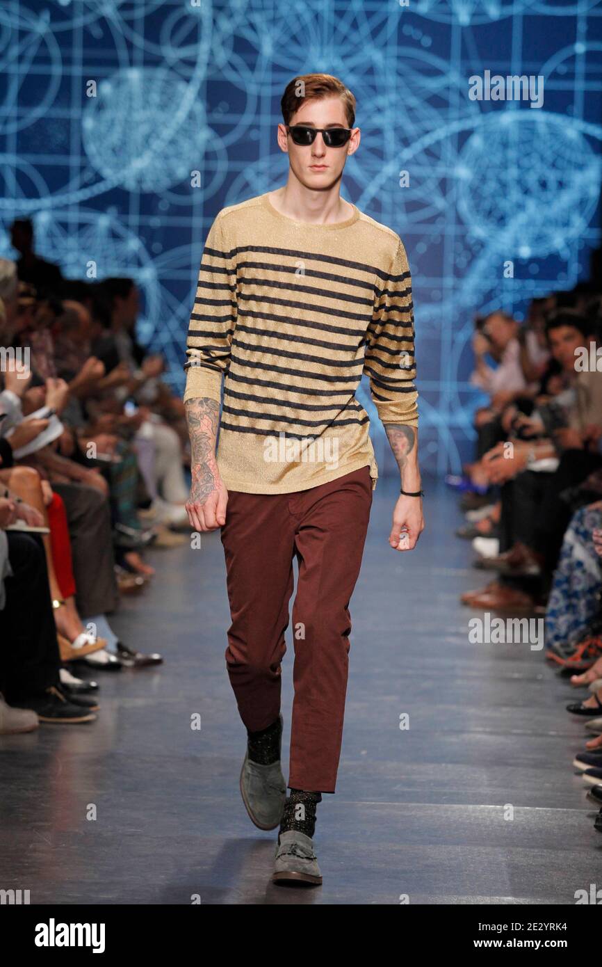 A model wears a creation by designer Paul Smith for his Men's Spring ...